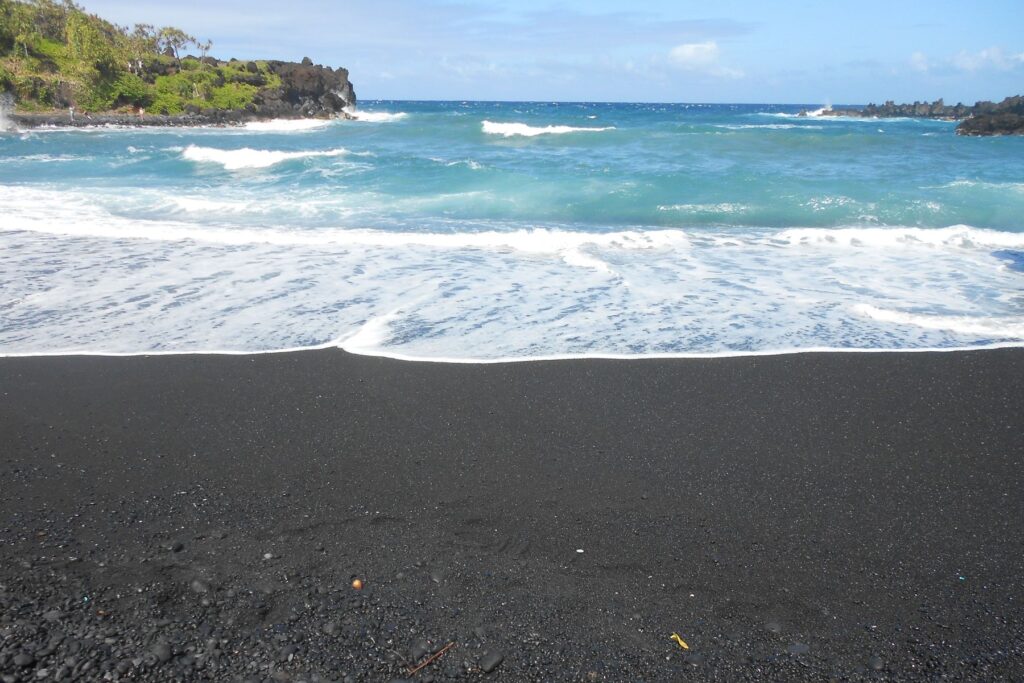 26 BEST Black Sand Beaches In The World